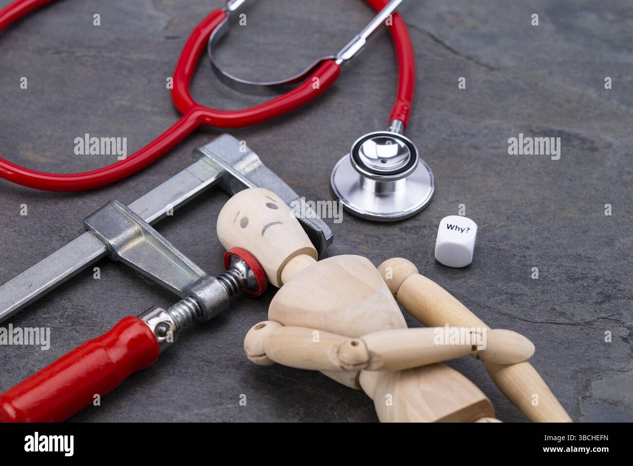 The photo shows a wooden dummy with a screw clamp and stethoscope Stock ...