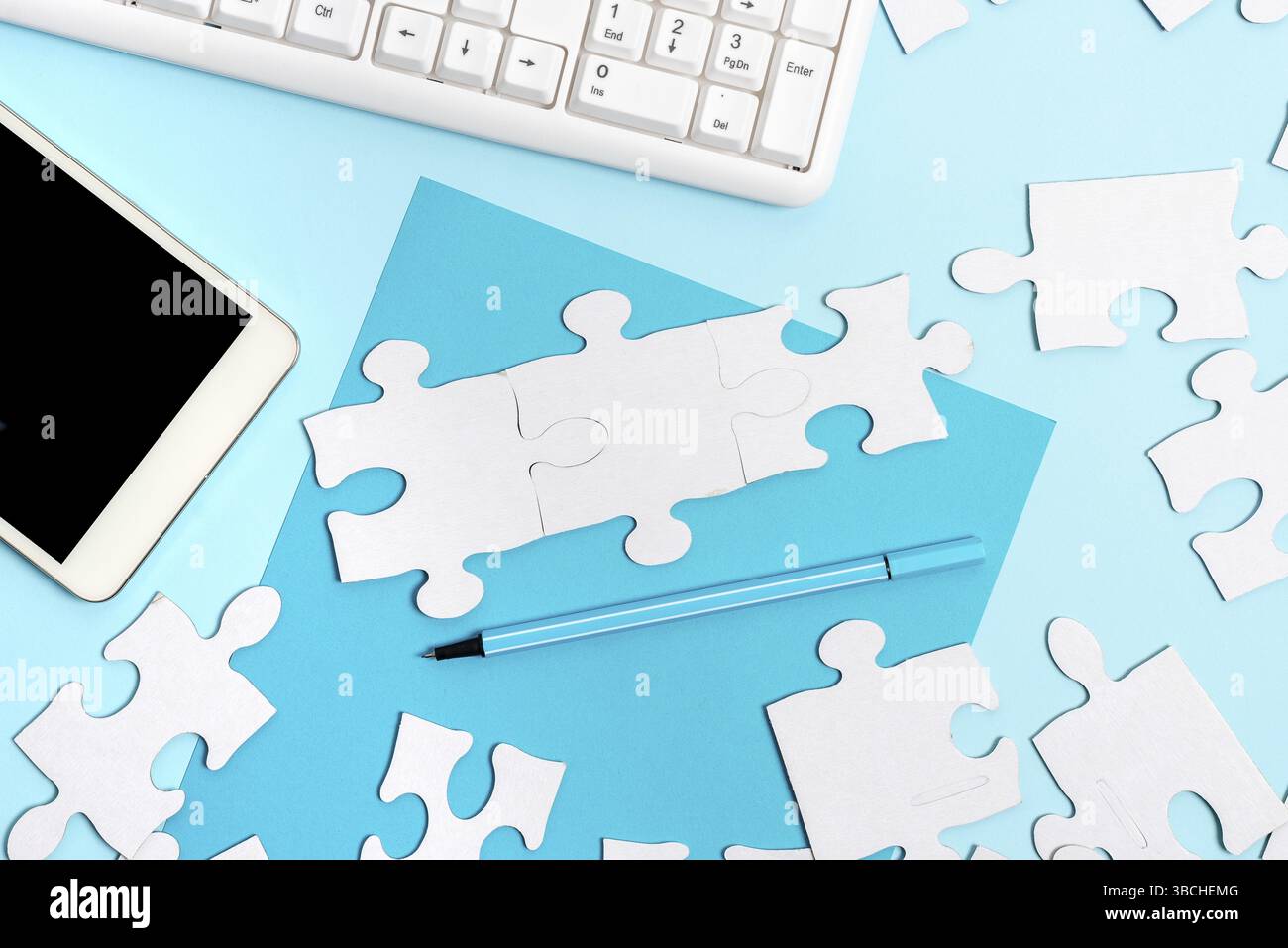 Building An Unfinished White Jigsaw Pattern Puzzle With Missing Last ...