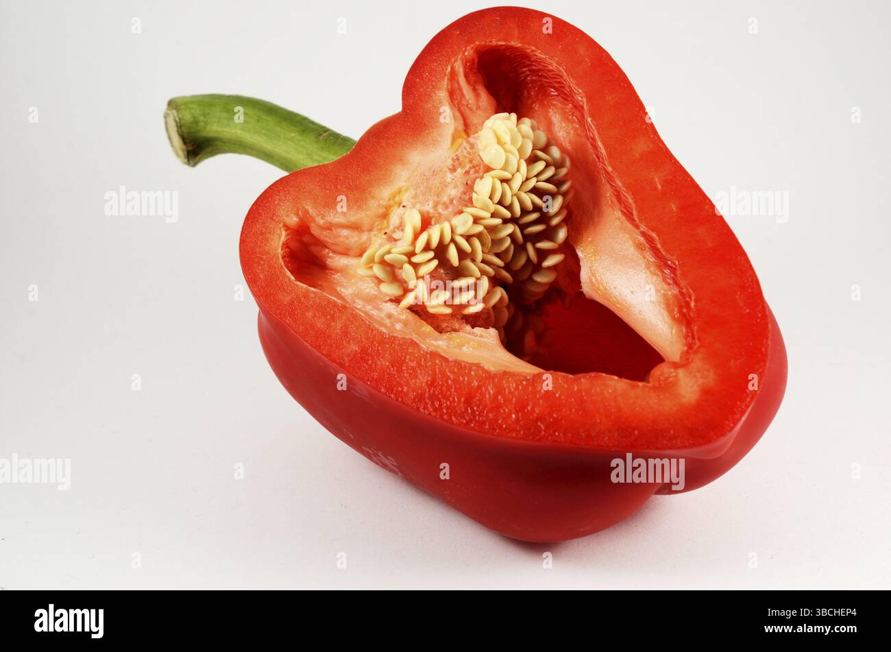 Half a pod of red pepper, horizontal Stock Photo - Alamy
