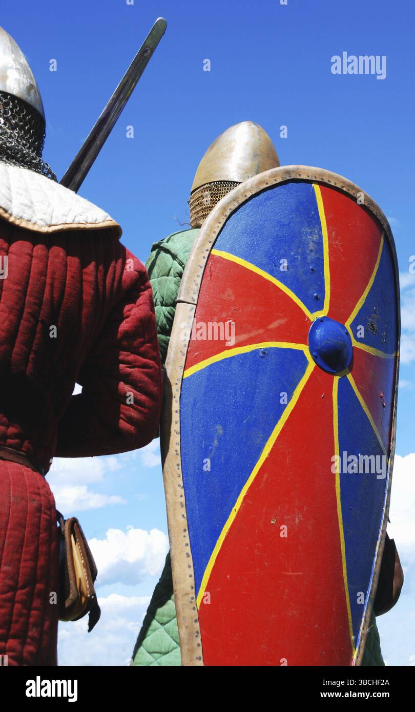Group of knights with helmets, shields and armors Stock Photo - Alamy