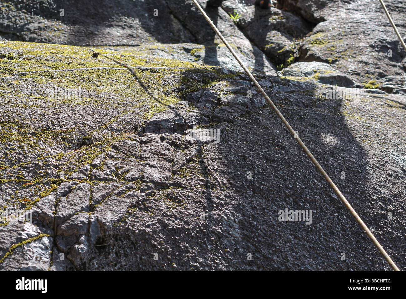 Climber's Rope Across A Positive Slope Stock Photo - Alamy
