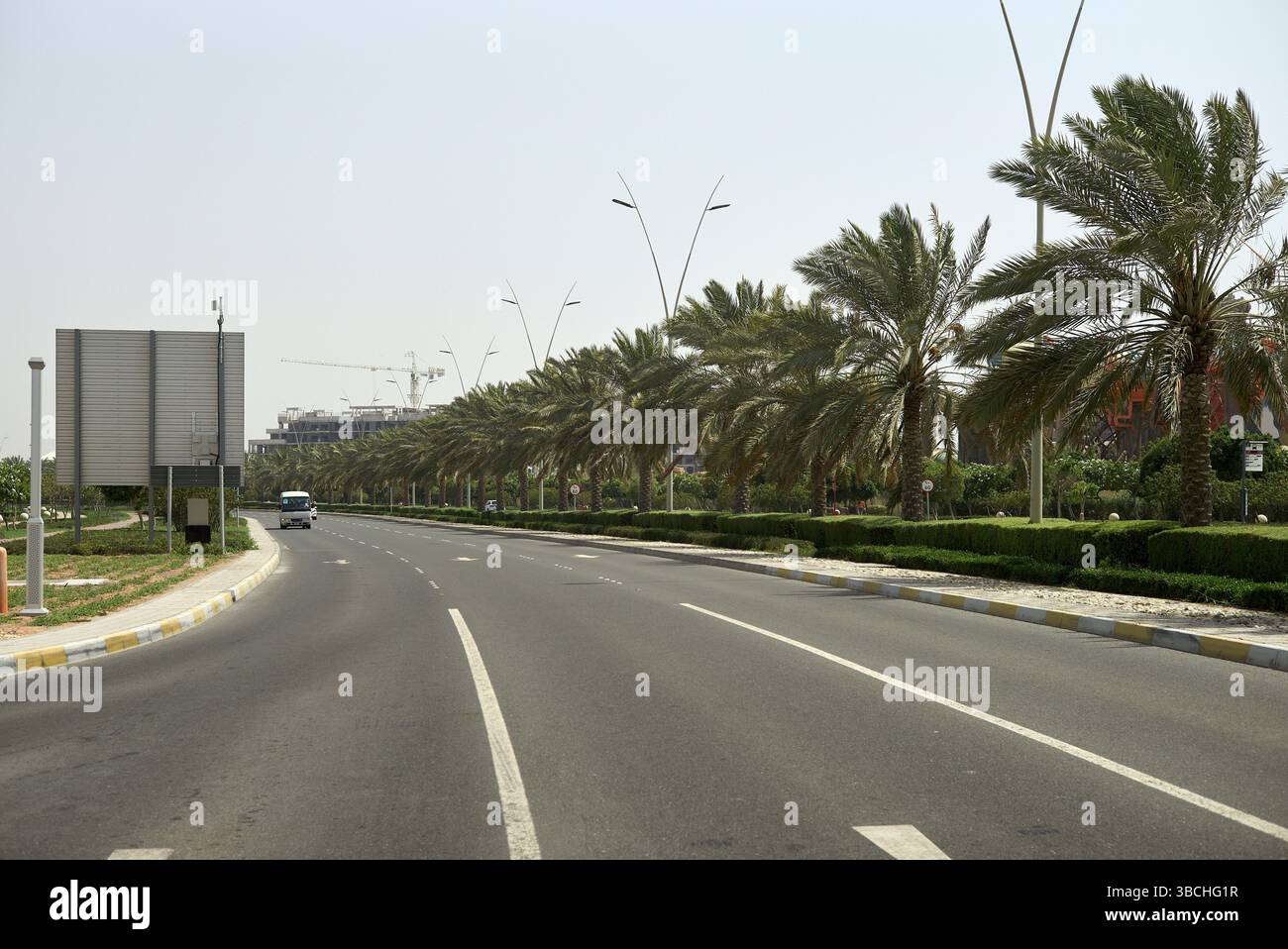 Street traffic palm trees sunny tropical setting hi-res stock ...