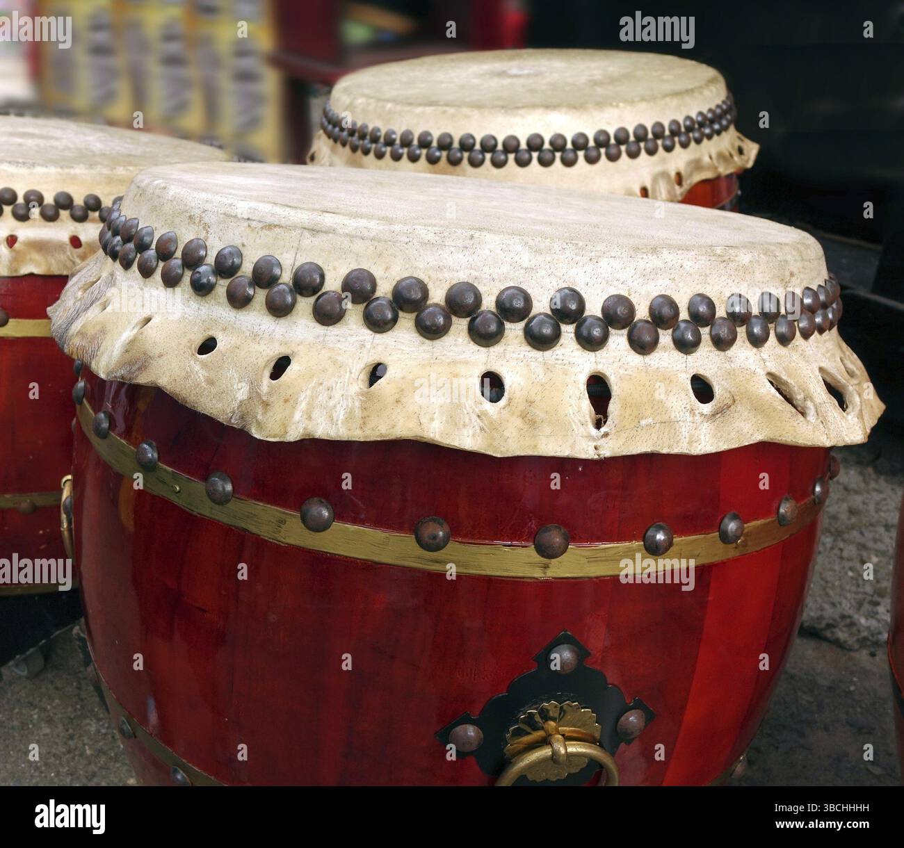 Large ceremonial Chinese drums with brass handles and big brass tacks ...