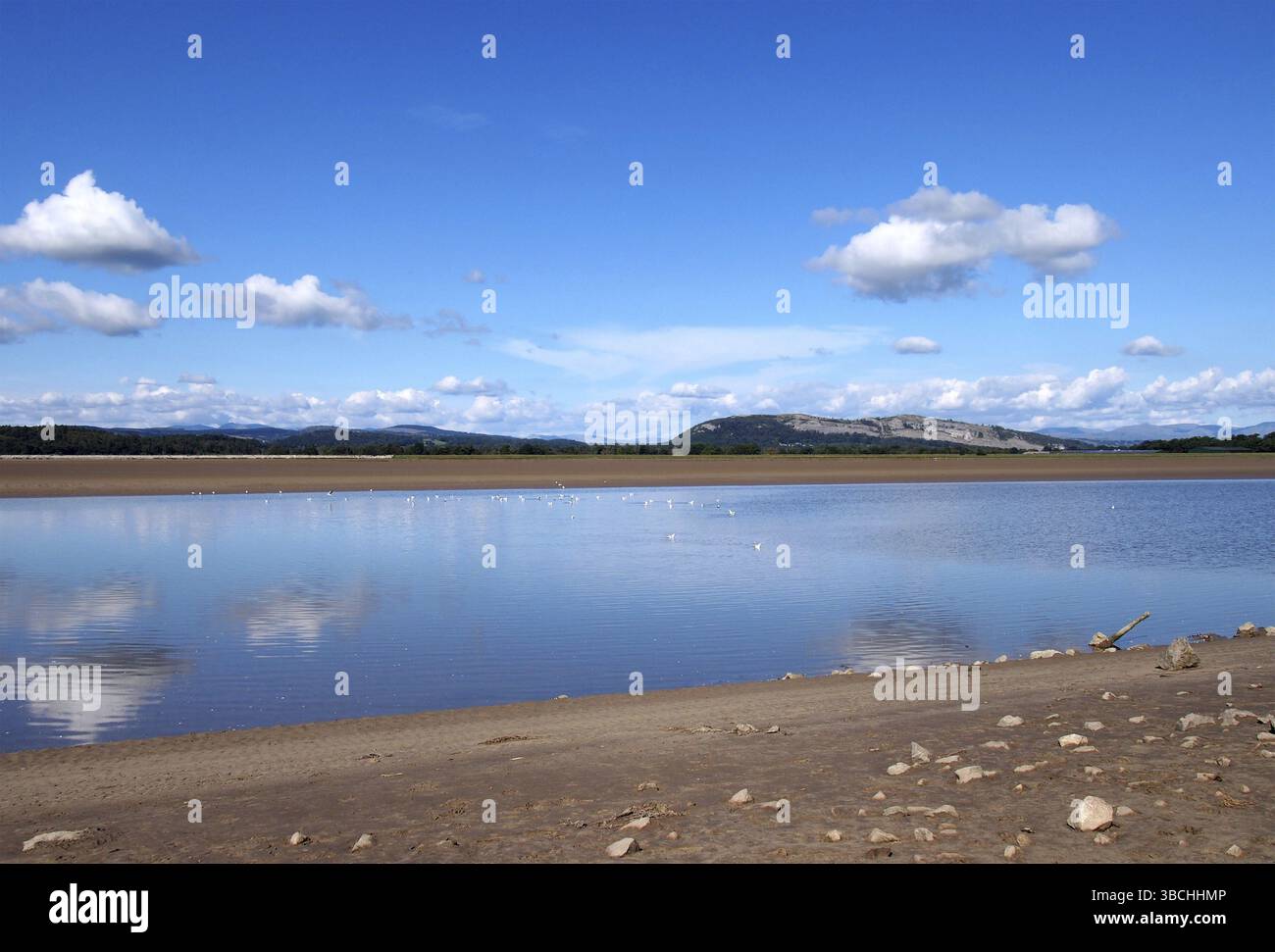 The river kent in cumbria with with lake district hills in the distance ...