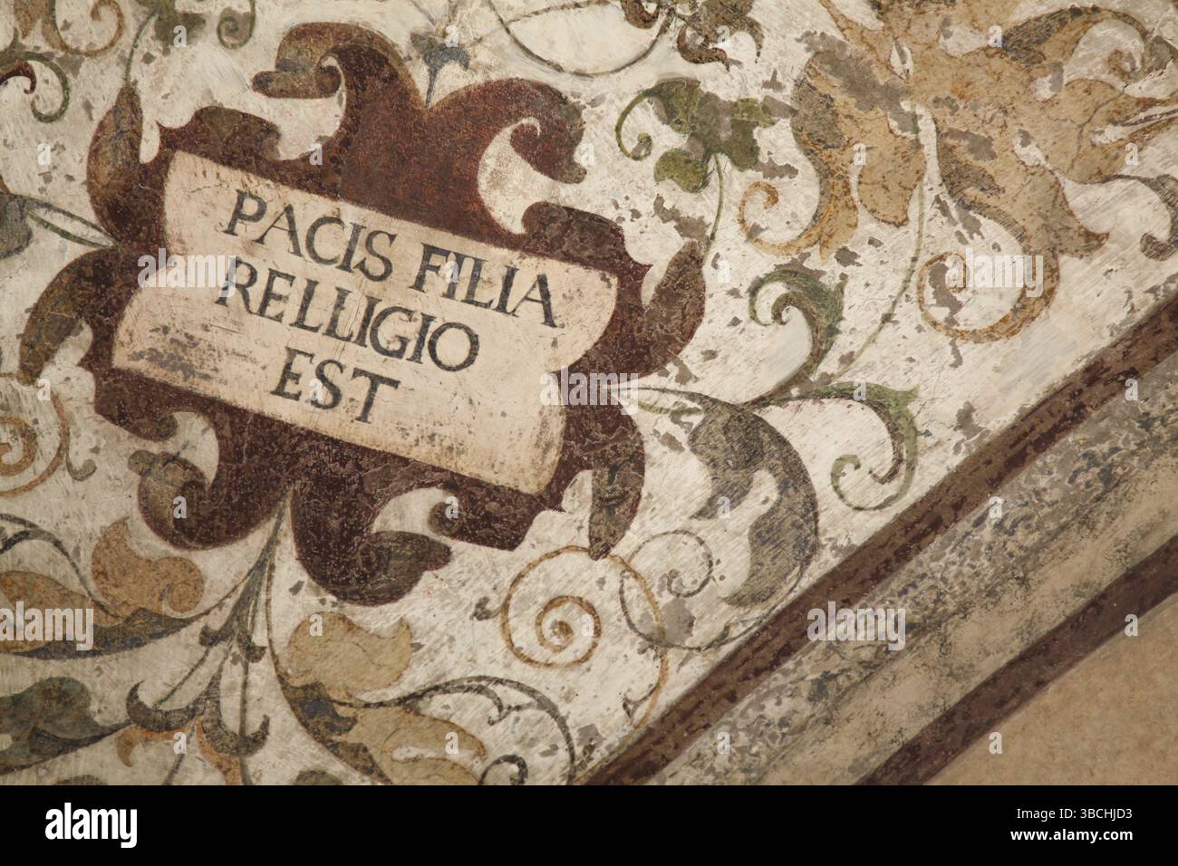 Writing on ceiling painting shows text about religion and peace Stock ...