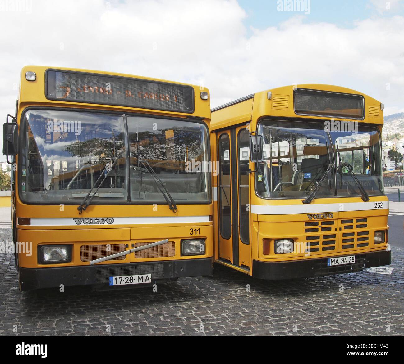 Funchal, madeira, portugal, 13 march 2019: two typical yellow public ...
