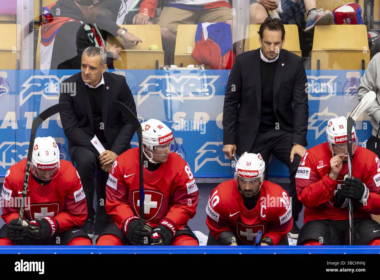 Patrick Fischer, right, head coach of Switzerland's national ice hockey ...