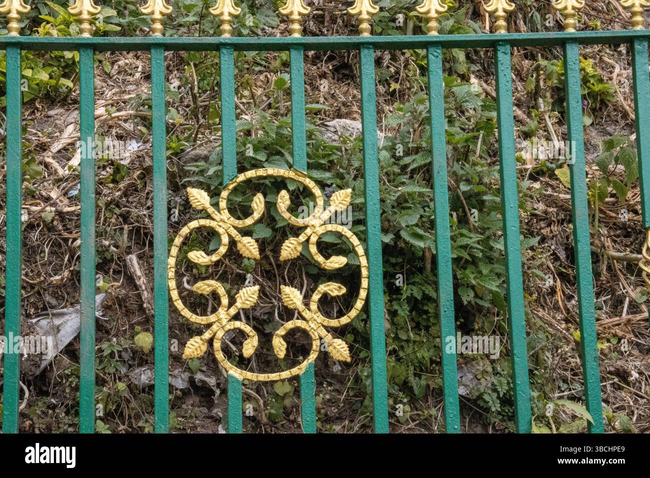 typical green and yellow painted iron railings in Darjeeling, India ...