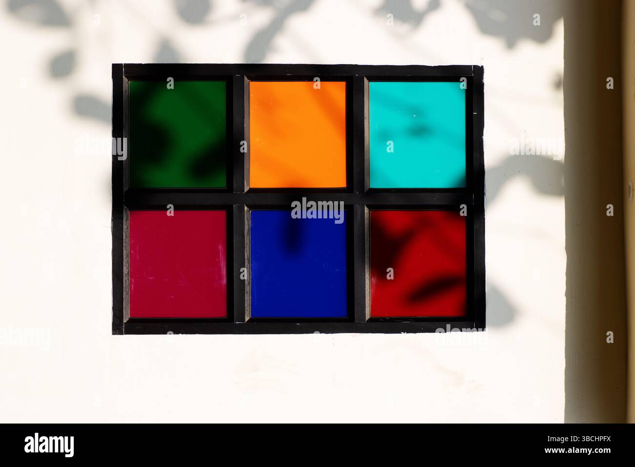 typical Indian coloured window panes in red, blue and green Stock Photo ...