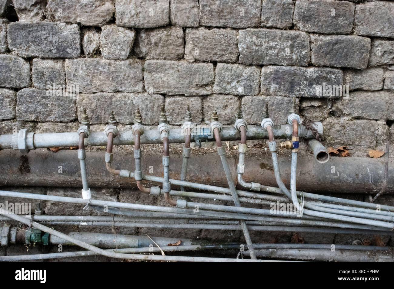 Typical large scale metal water suply pipe for the town and homes in ...