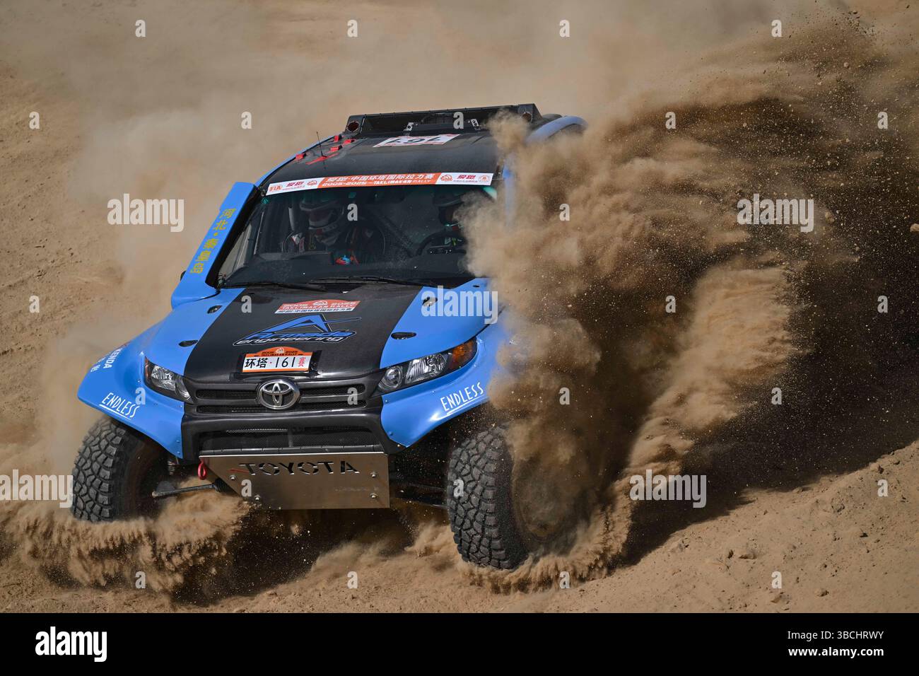 Aksu, China's Xinjiang Uygur Autonomous Region. 20th May, 2025. Driver ...