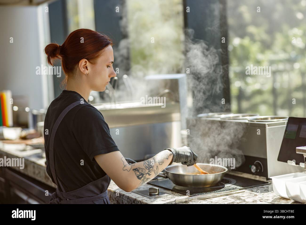 A Professional Chef is Preparing an Exquisite Gourmet Dish in a Modern Kitchen Space Stock Photo ...
