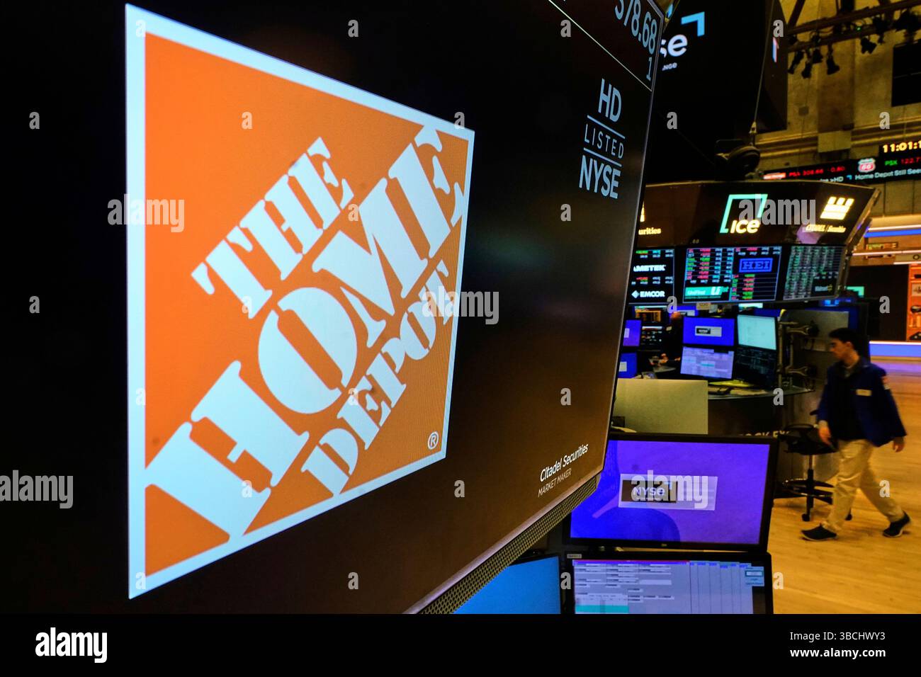 The logo for Home Depot is displayed above a trading post on the floor ...