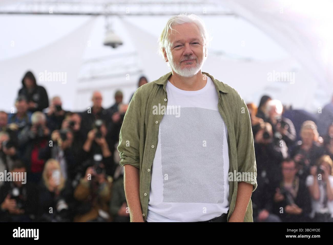 Julian Assange poses for photographers at the photo call for the film ...