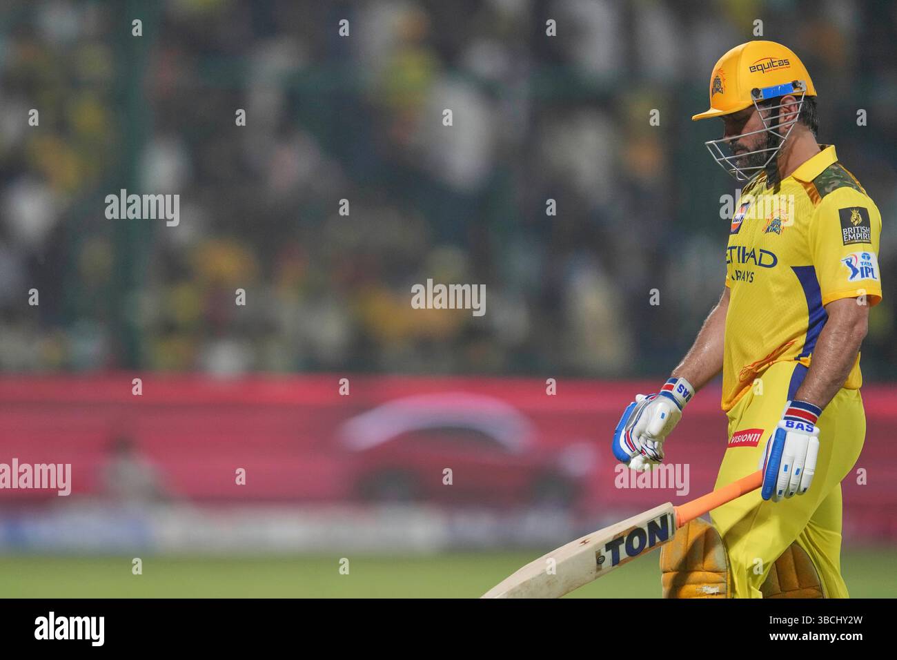 Chennai Super Kings' captain Mahendra Singh Dhoni walks off the field after losing his wicket ...