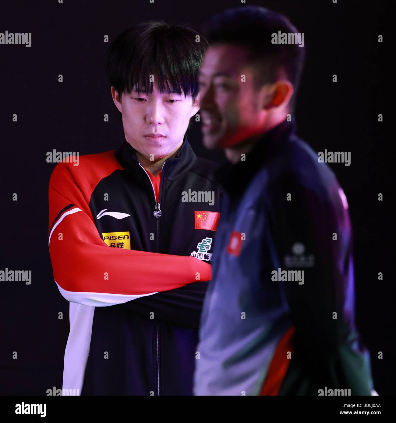 Doha, Qatar. 20th May, 2025. Wang Chuqin (L) and Wong Chun Ting react before the men's singles ...