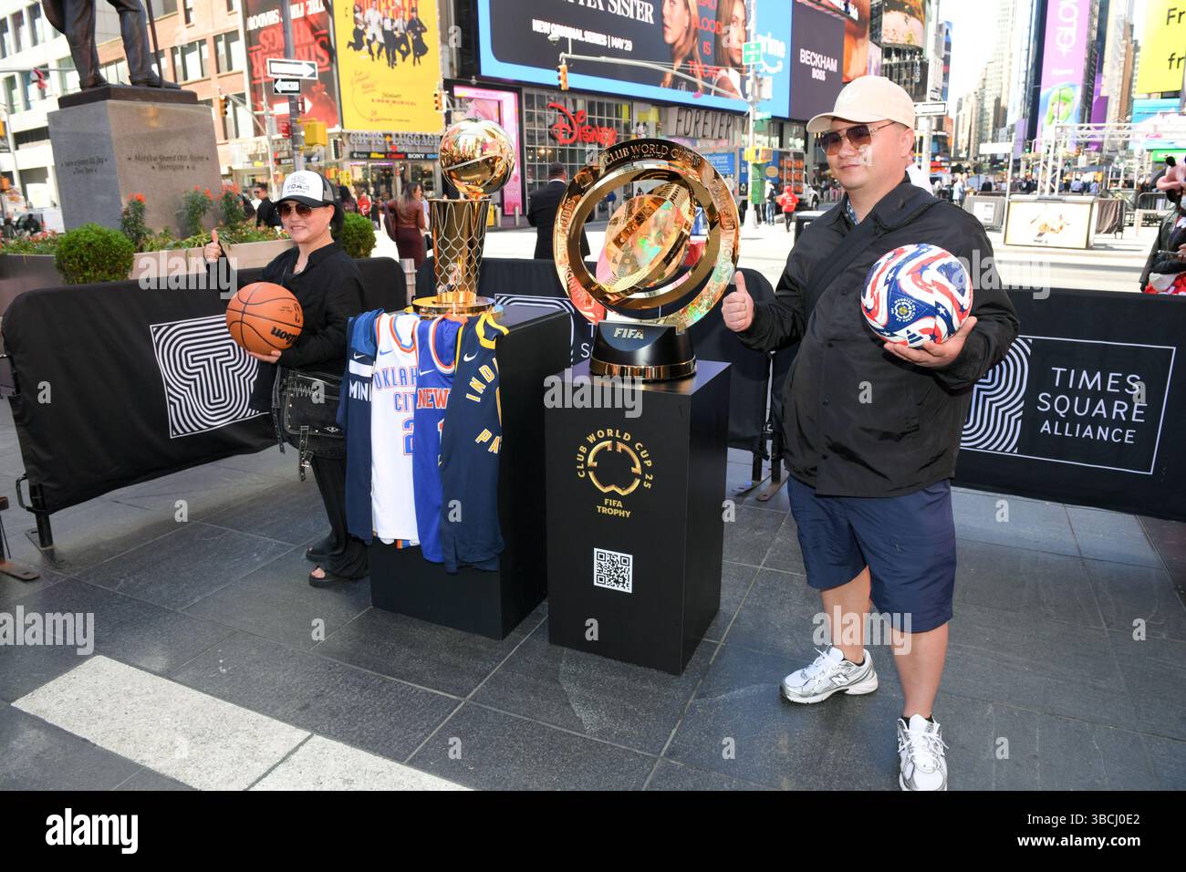 New York, USA. 20th May, 2025. Fans pose with the trophies during FIFA ...