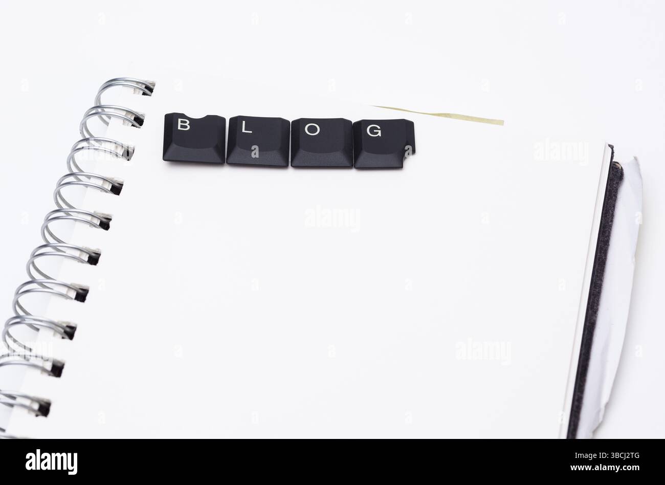 Image shows an opened notepad with characters Stock Photo - Alamy