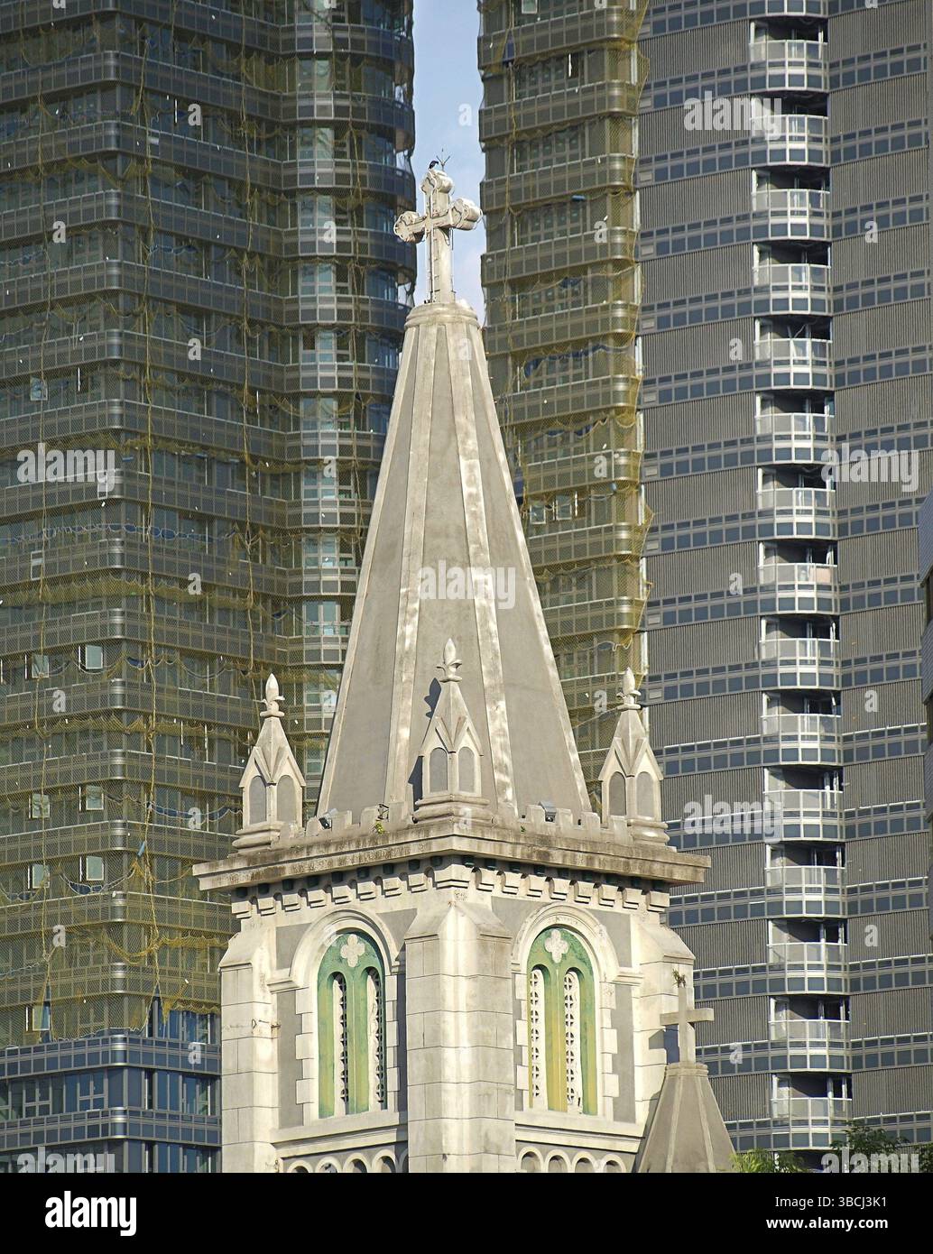 An old church building from 150 years ago is surrounded by modern ...