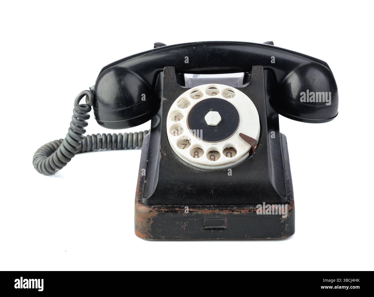 Vintage black phone with rotary dial isolated on a white background ...