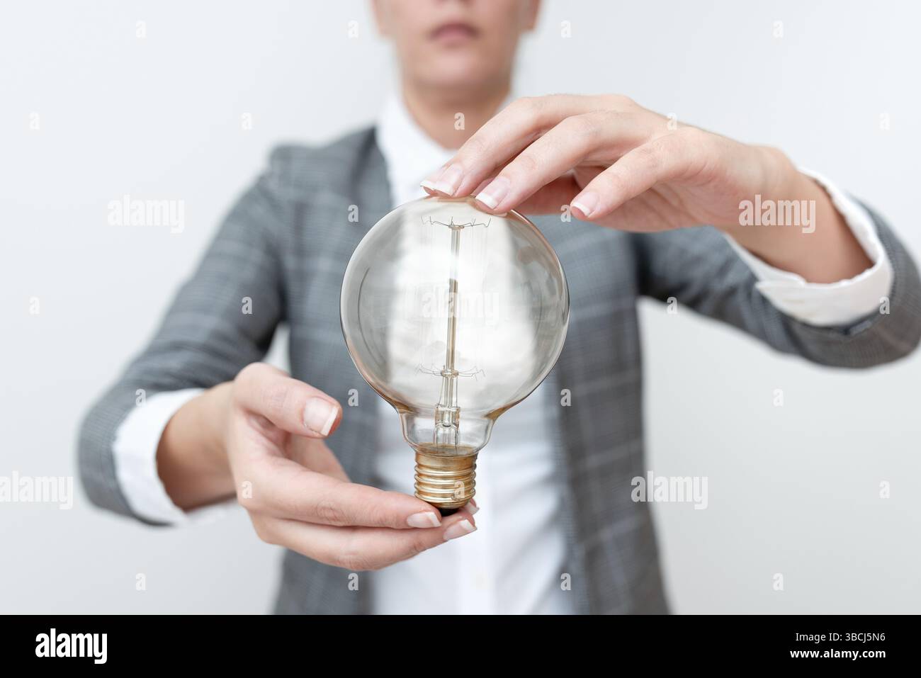 Lady Holding Lamp With Formal Outfit Presenting New Ideas For Project ...