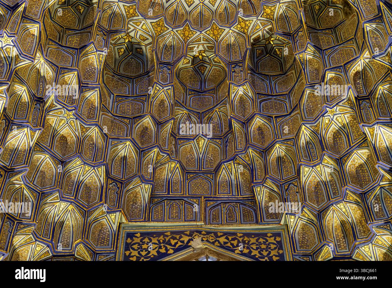 Golden muqarnas ceiling shines inside the Gur-e-Amir Mausoleum in ...