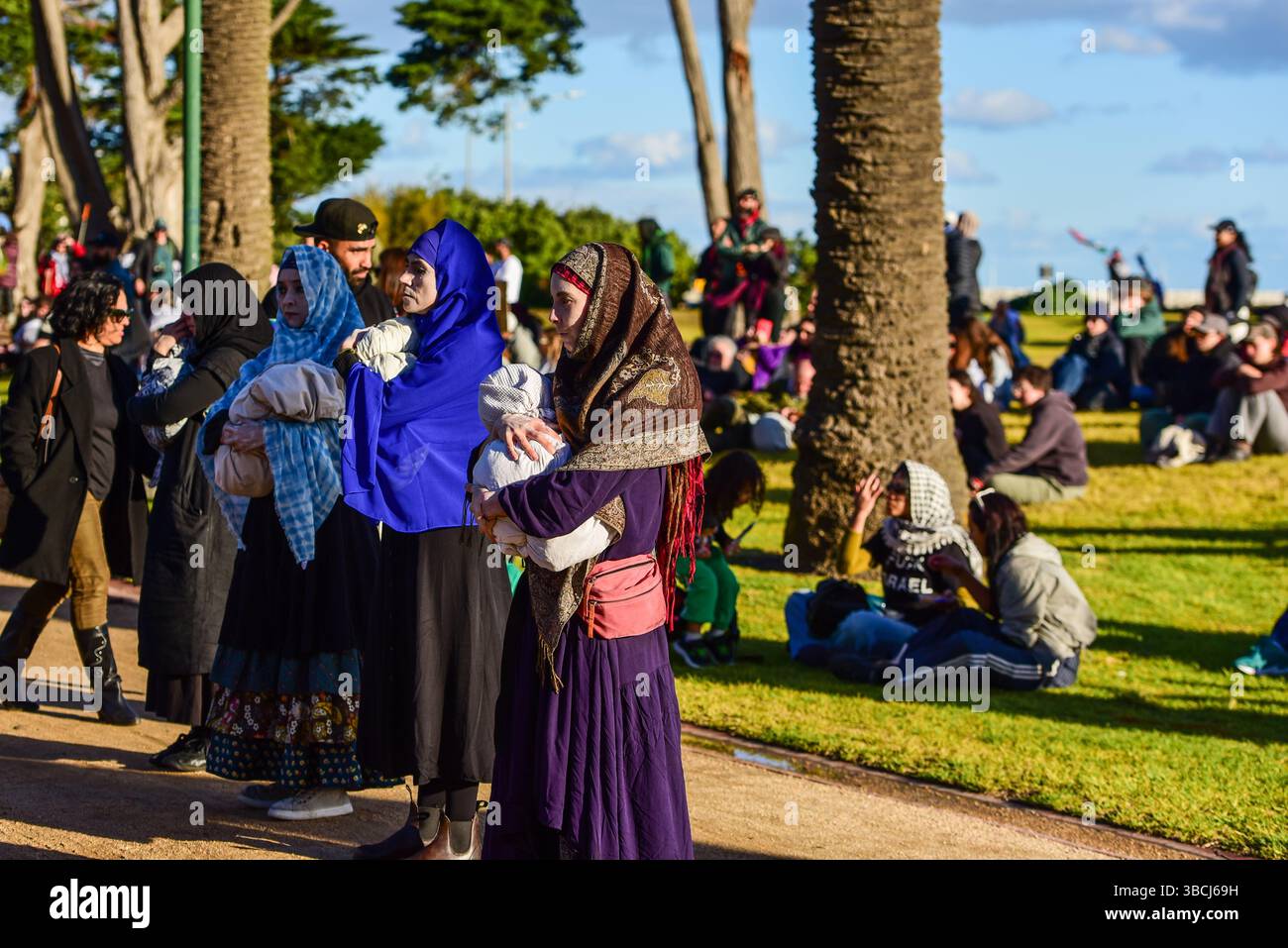 A group of women seen staging a protest with mock babies during Nakba ...