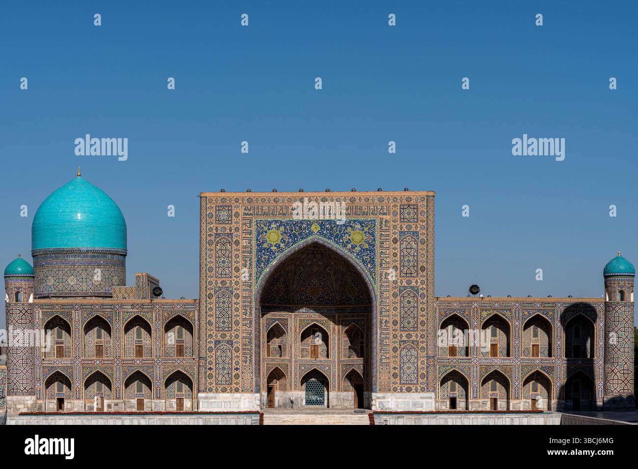 In Samarkand, Uzbekistan, Tilya Kori Madrasa at Registan displays a ...