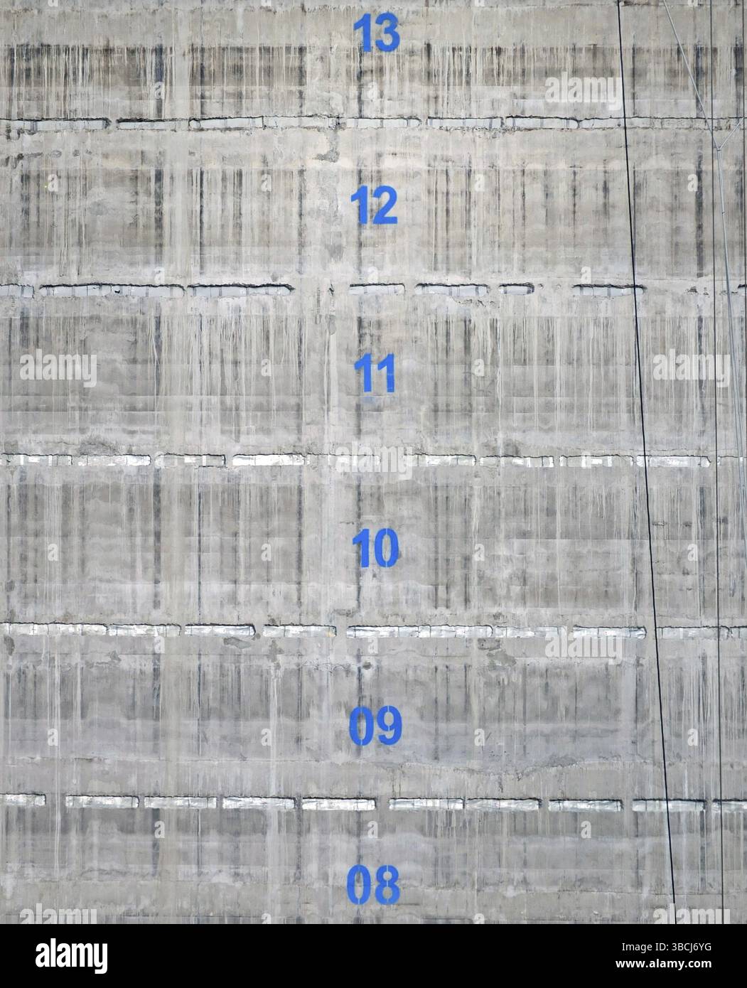 The surface of a concrete service tower core of a building under ...