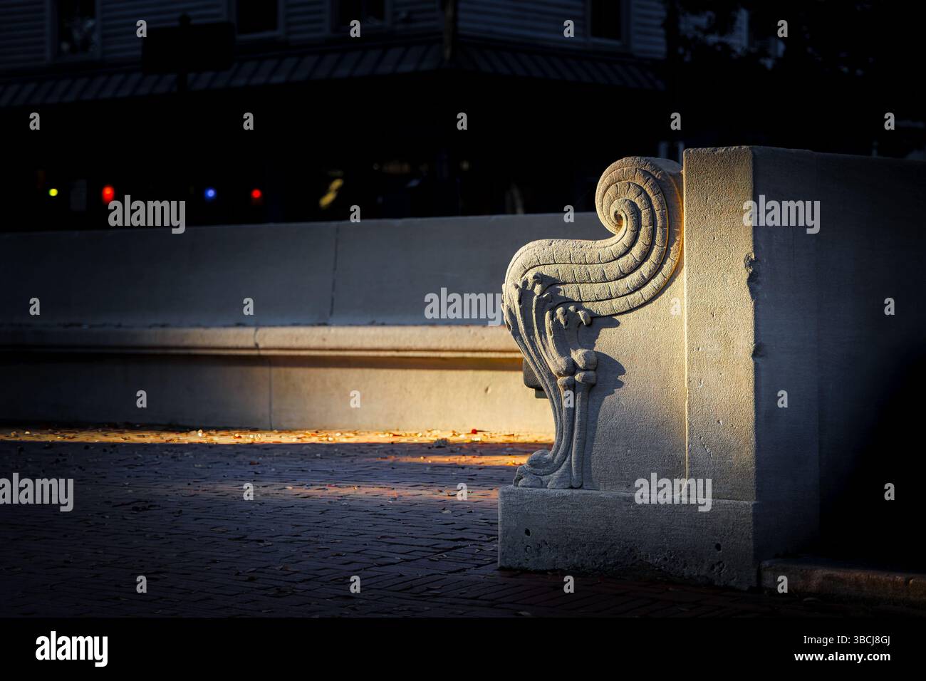 The sun rises on large bench seats at both ends of Chippewa Square at ...