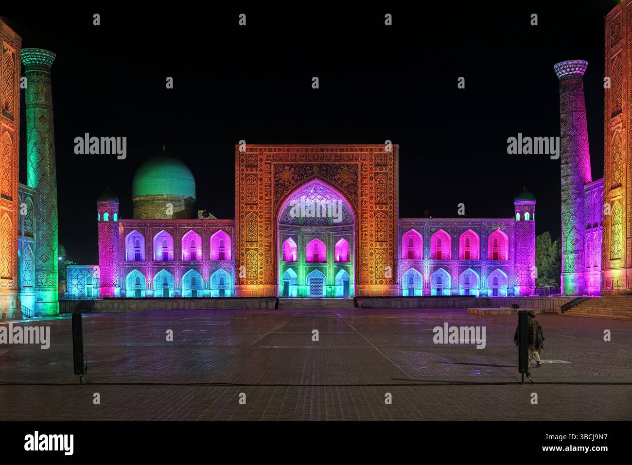 Tilya Kori Madrasa glows in multicolored lights with illuminated domes ...