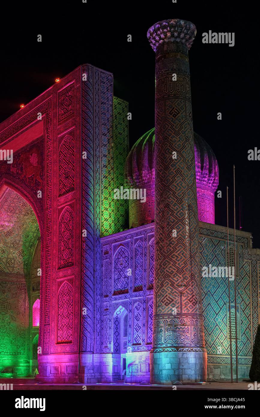 Colored lights in red, gold and green accentuate the Sherdor Madrasa’s ...