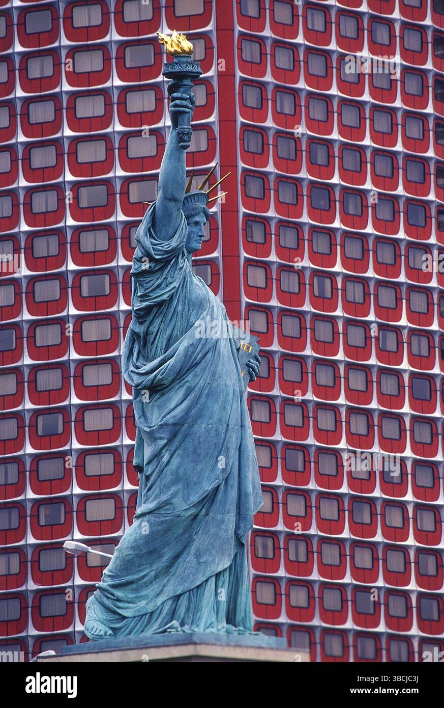 Original Statue of Liberty in front of tower block, Paris, France ...