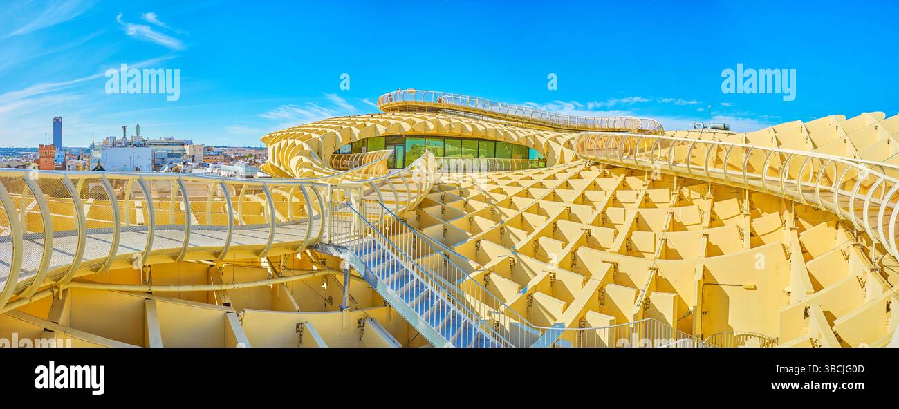Panorama of the roof of Metropol Parasol with curved footbridge leading ...