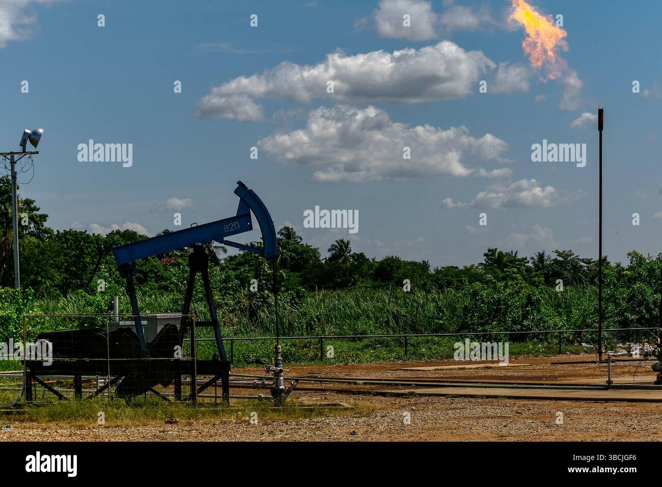 Cabimas, Zulia, Venezuela. 29-11-2025.An oil pump is seen next to a gas ...