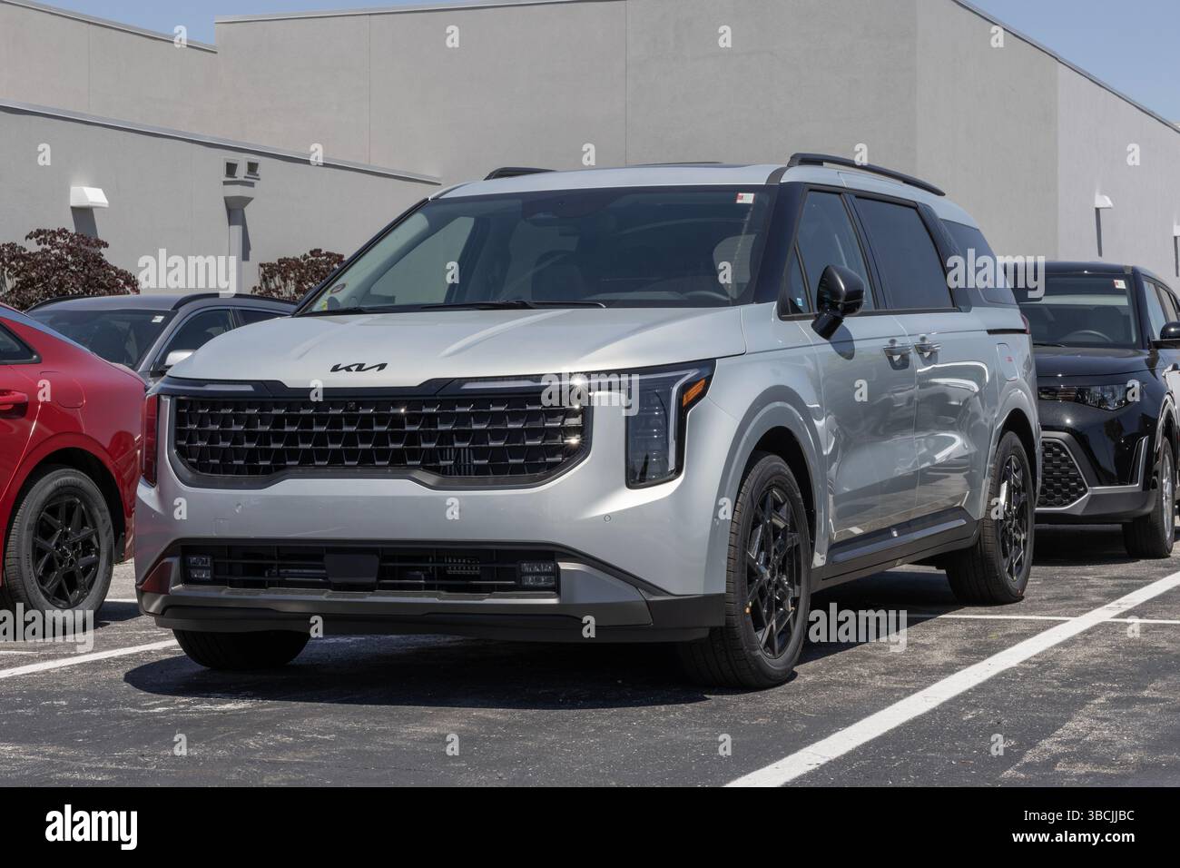 Avon - May 18, 2025: Kia Carnival Hybrid SX Prestige SUV display. Kia ...