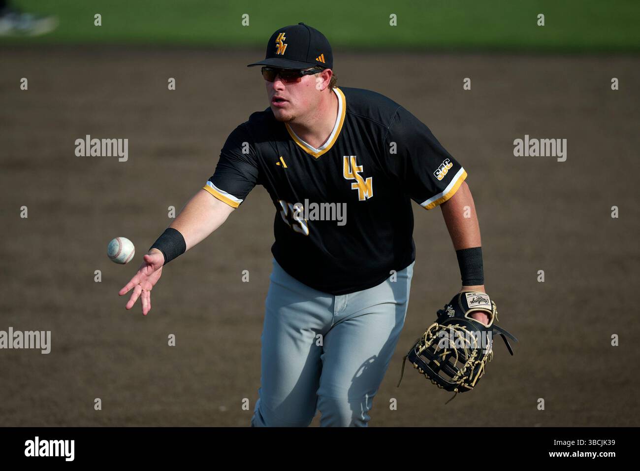 Southern Miss Golden Eagles first baseman Braden Luke (25) flips the ...