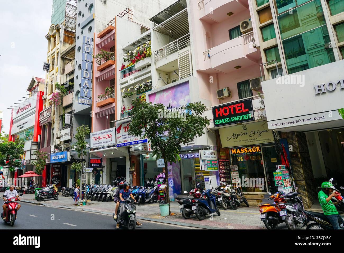 Ho Chi Minh City, Vietnam- March 16, 2025: Colorful, narrow, tall ...