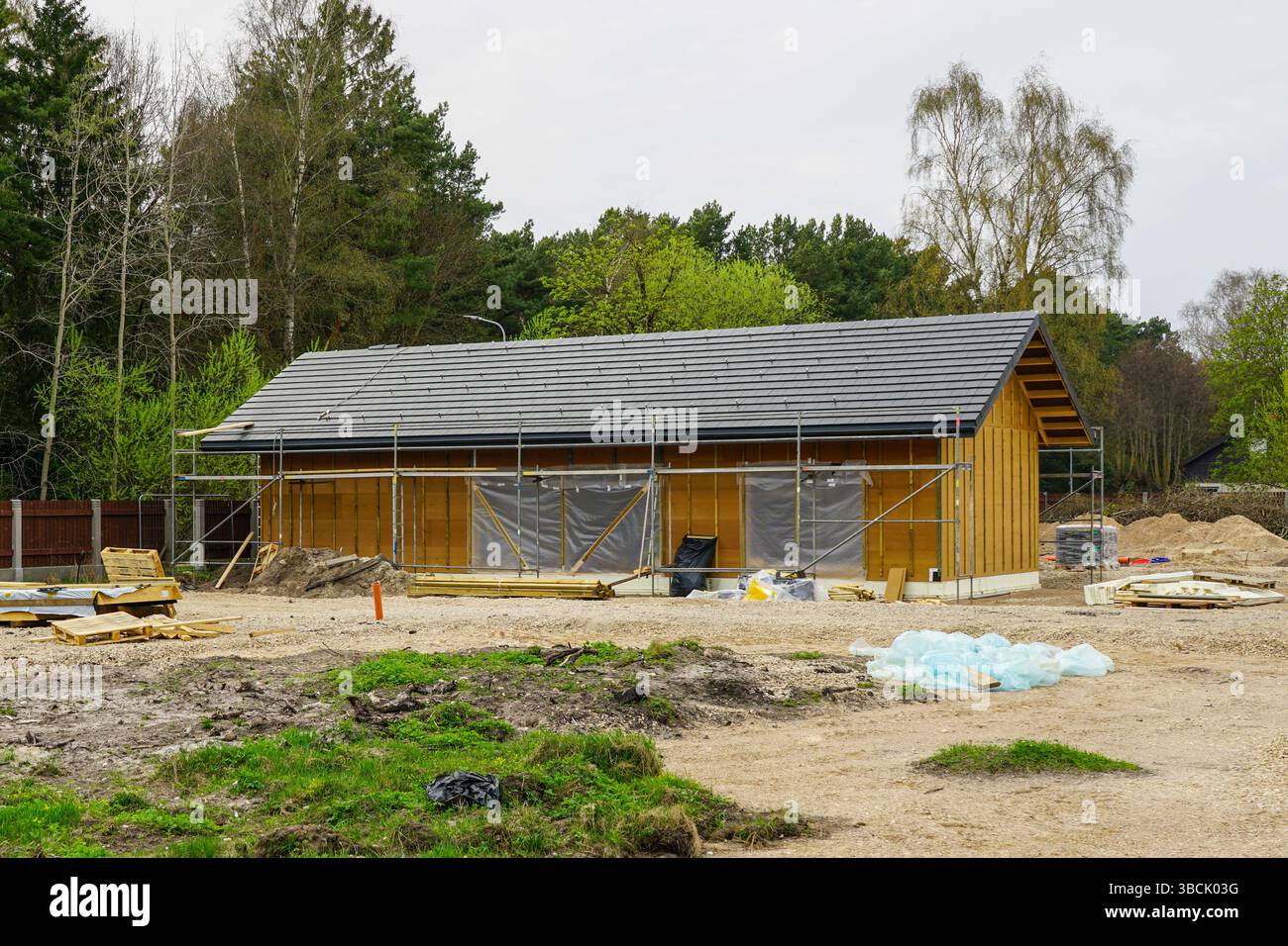Modern Wooden House Under Construction Near Forest, Sustainable ...
