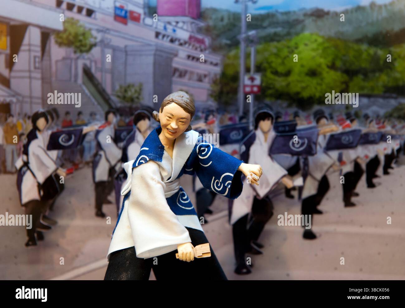 Miniature diorama of Japanese Yosakoi summer festival dancers in yukata ...