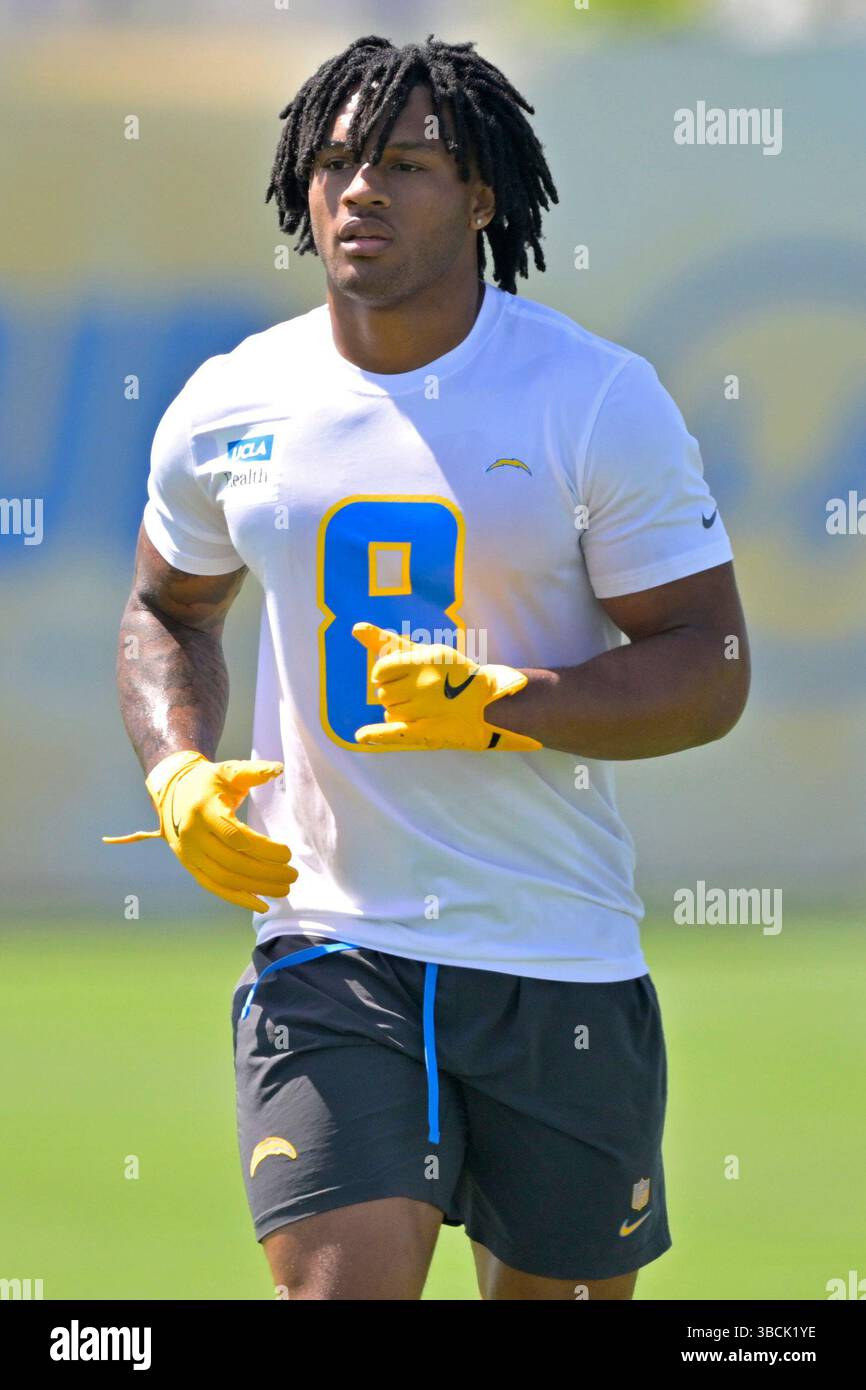 Los Angeles Chargers running back Omarion Hampton jogs on the field ...