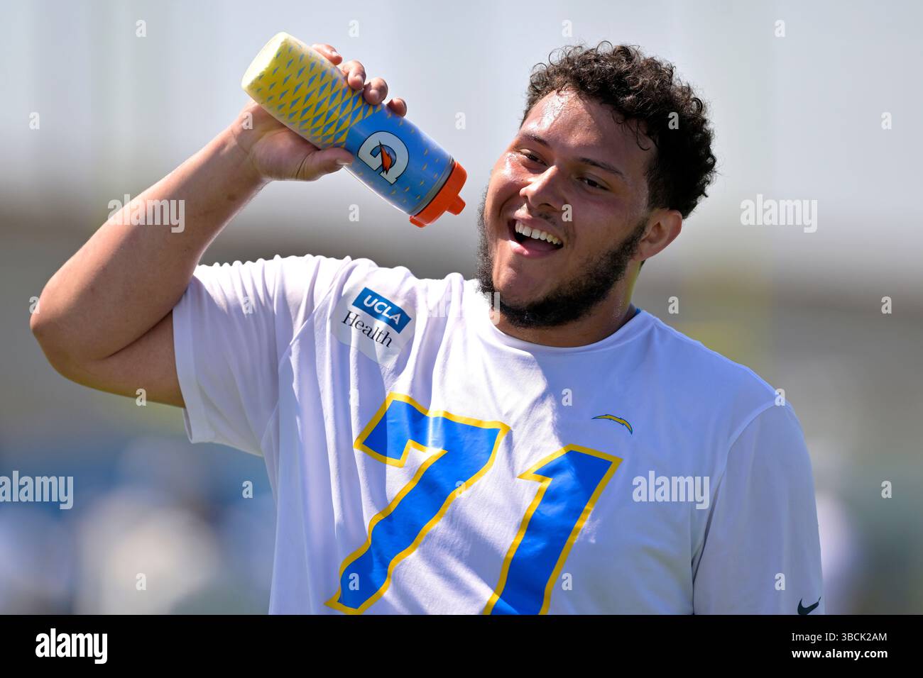 Los Angeles Chargers offensive tackle Branson Taylor takes a break ...