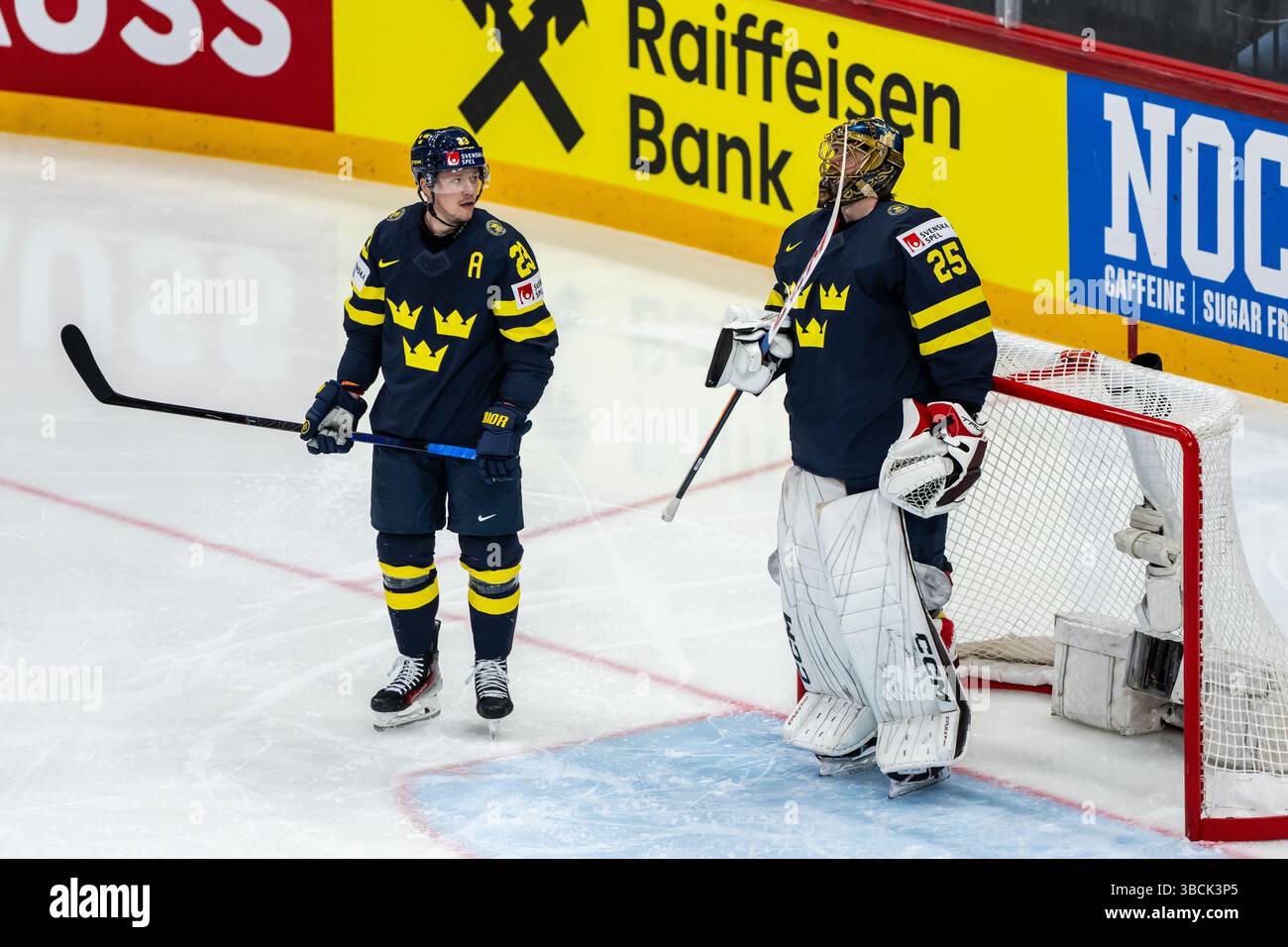 Lucas Raymond and goaltender Jacob Markström of, Sweden. , . look dejected after 0-1 during the ...