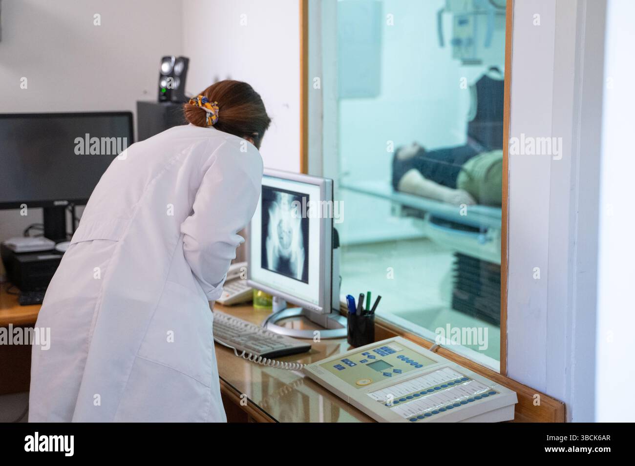 Radiologist Analyzing X-Ray Scans in a Medical Imaging Room Stock Photo ...