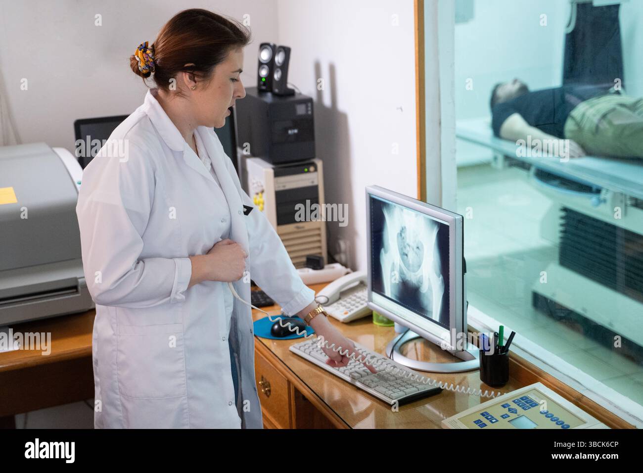 Radiologist Analyzing X-Ray Scans in a Medical Imaging Room Stock Photo ...