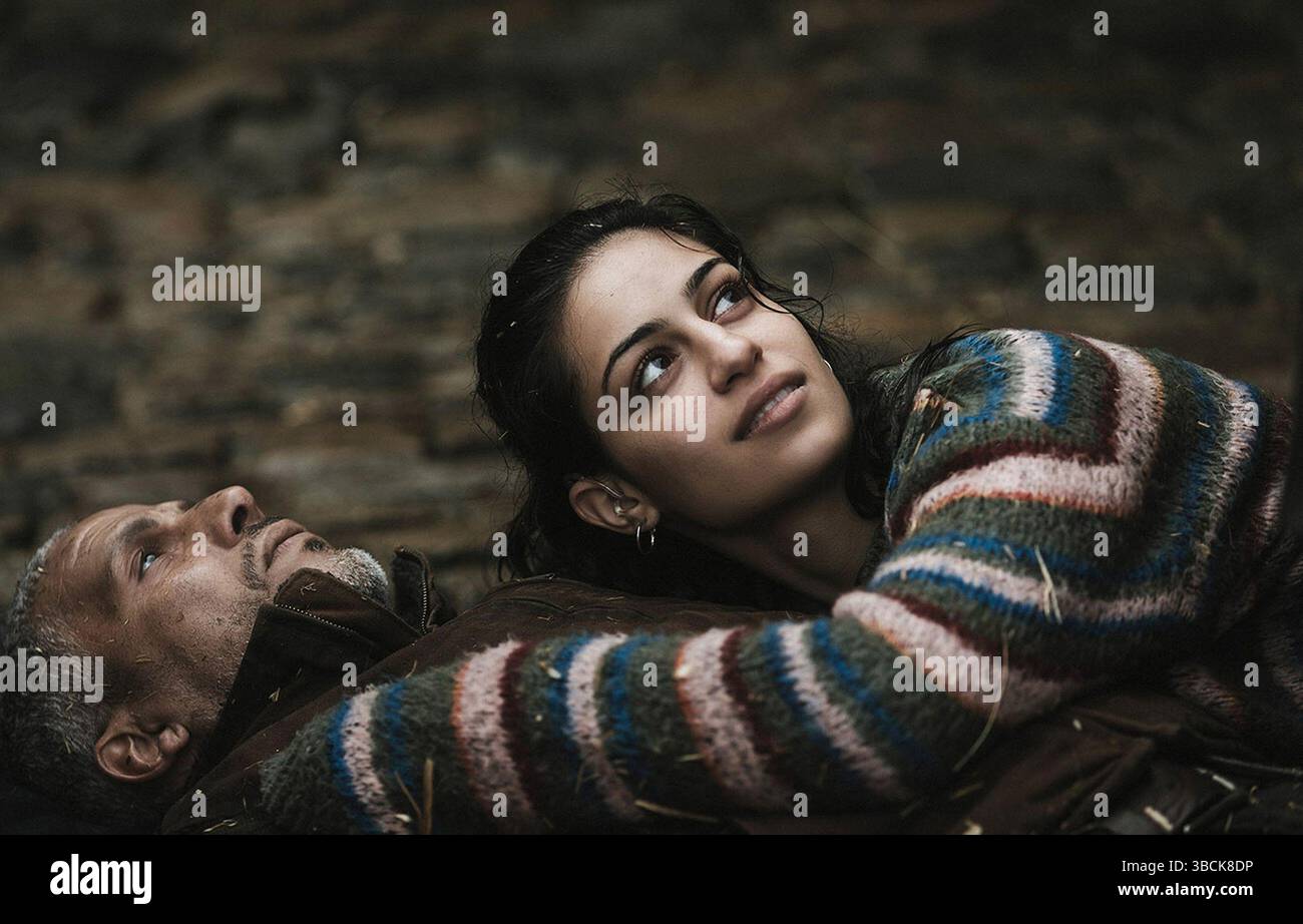 Sami Bouajila, Sofia Lesaffre, "Earth and Blood" (2020) Credit: Caroline Lessire / Netflix Stock ...