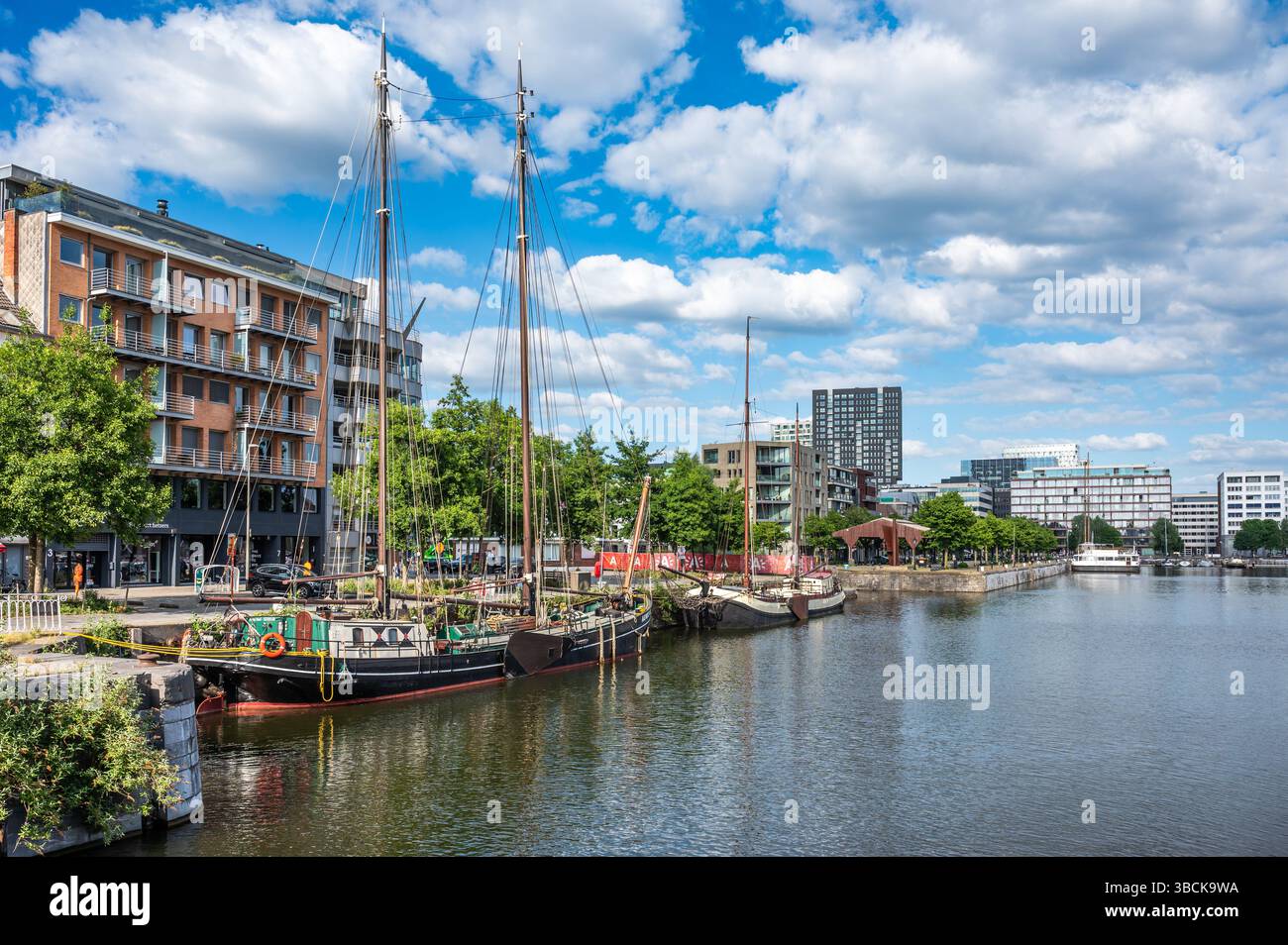 The Willem dock inner harbour, contemporary apartment blocks and ships ...