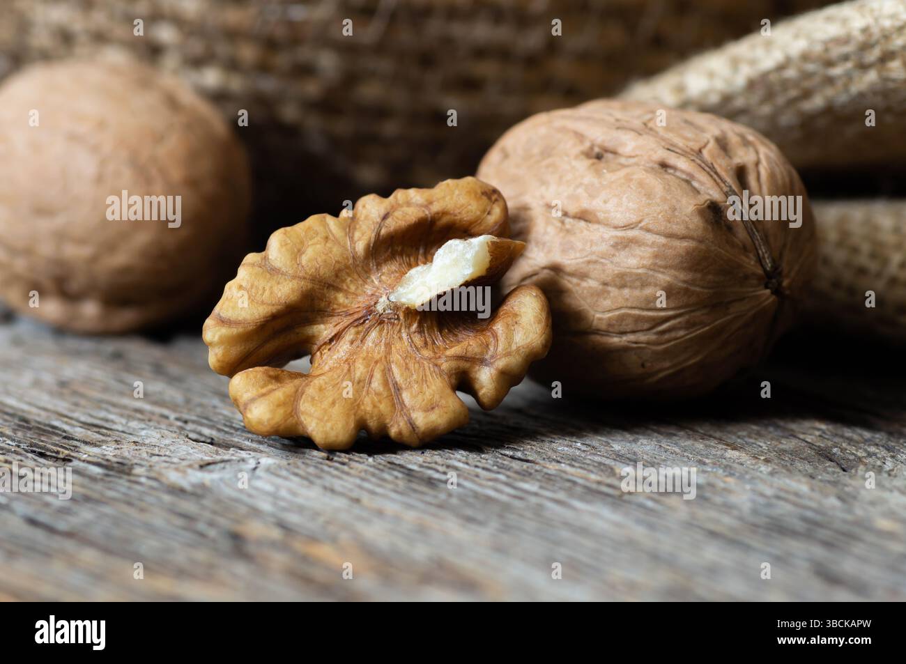 Close up ripe and fresh walnut kernel without shell on wooden rustic ...