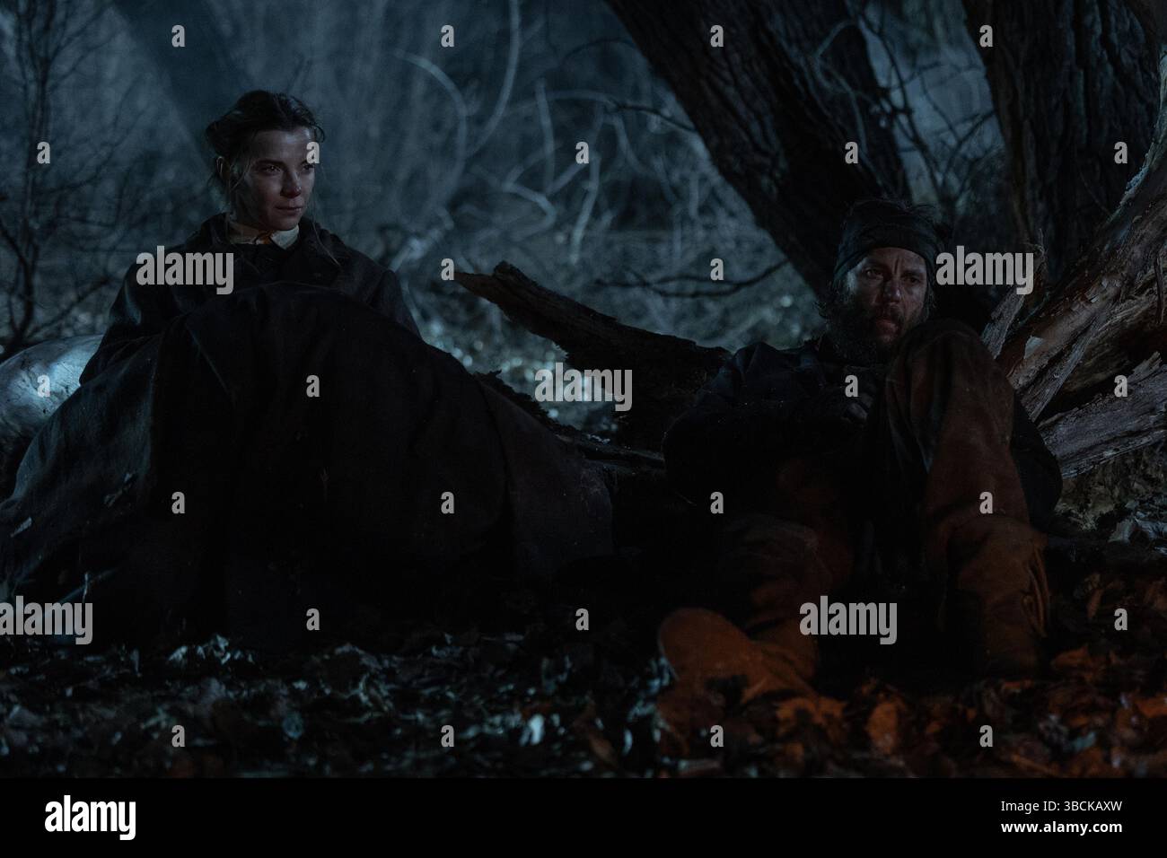 Betty Gilpin, Taylor Kitsch, "American Primeval" (2025). Photo credit: Matt Kennedy/Netflix ...