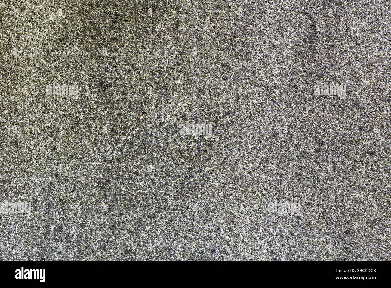 Natural stone granite wall with rough structure Stock Photo - Alamy